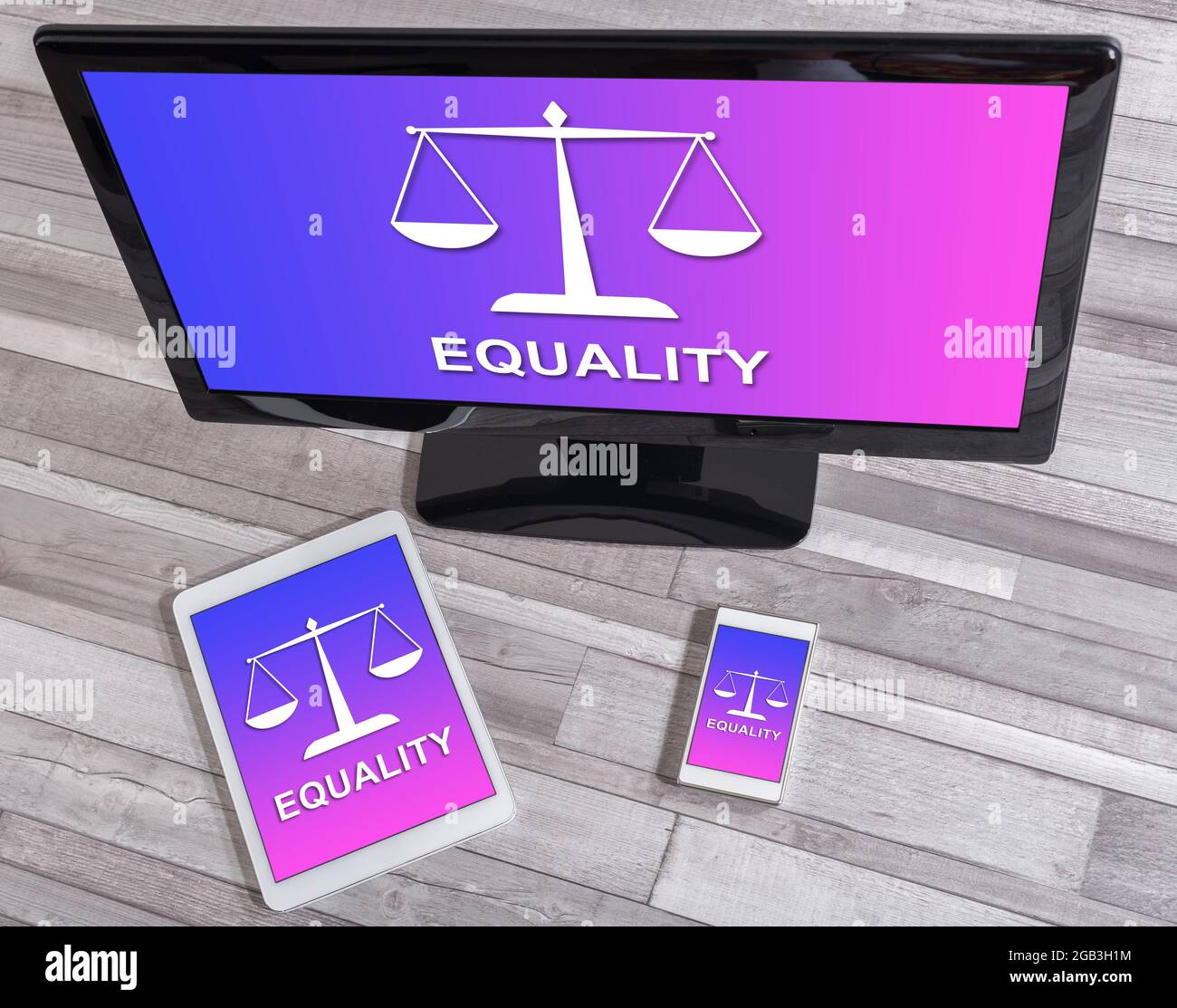 Equality concept shown on different information technology devices ...