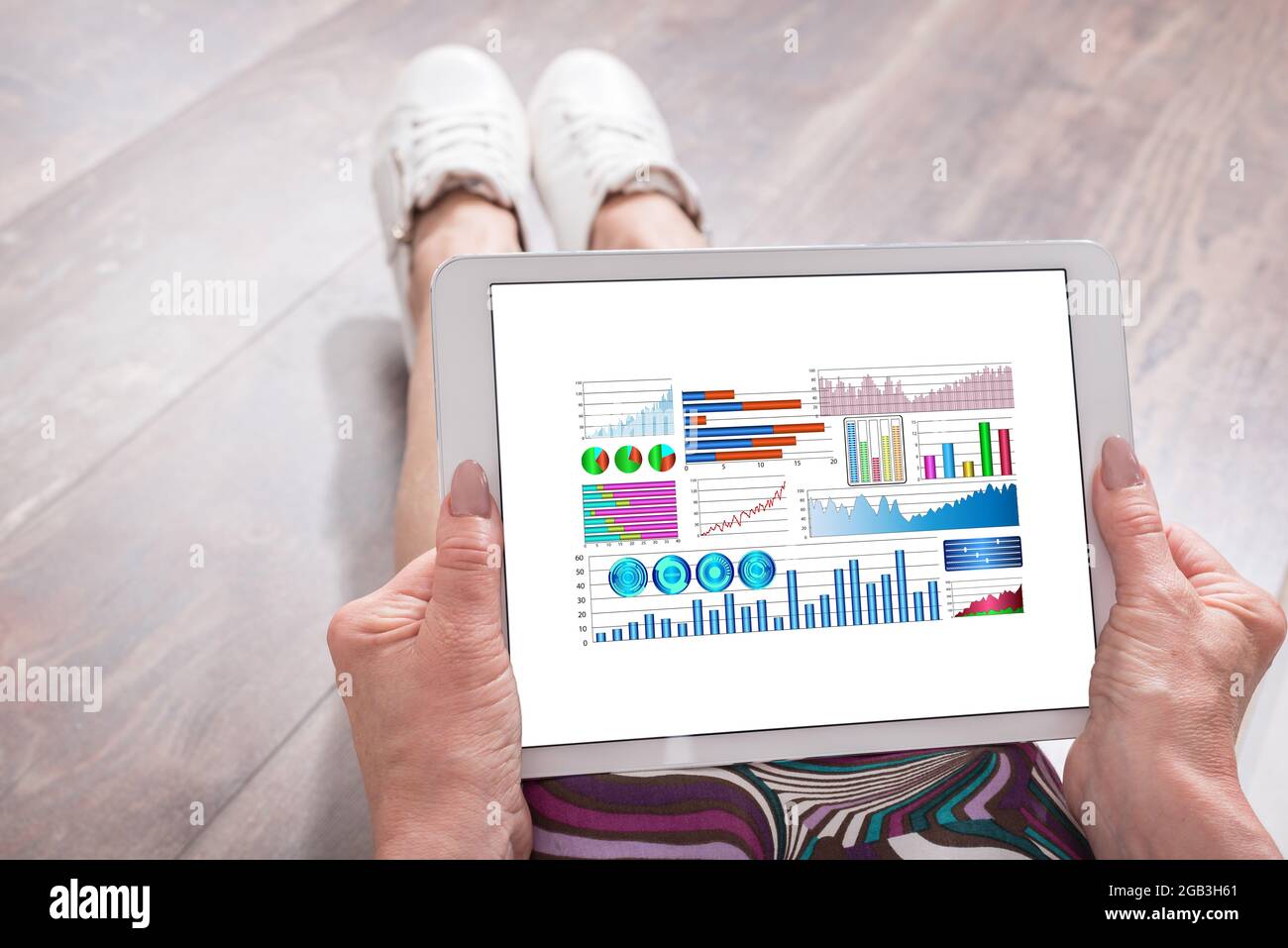 Woman showing progress report on hi-res stock photography and images ...