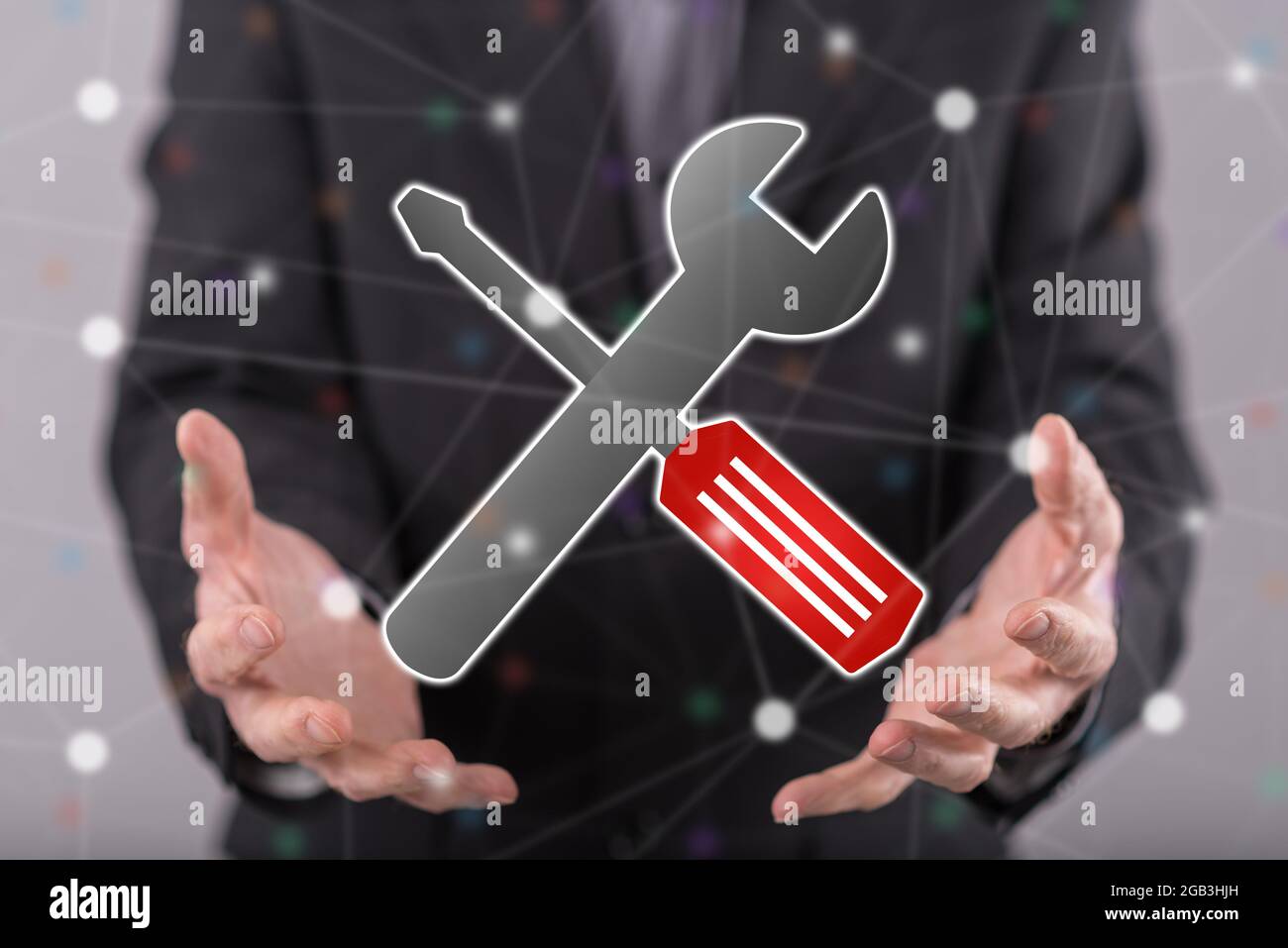 Maintenance service concept above the hands of a man in background ...