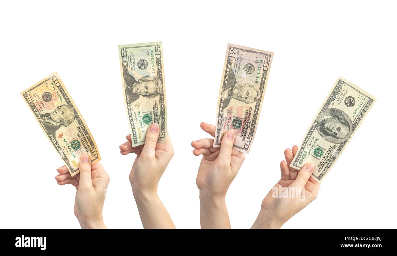 Set of US dollar banknotes in hand isolated on a white background ...