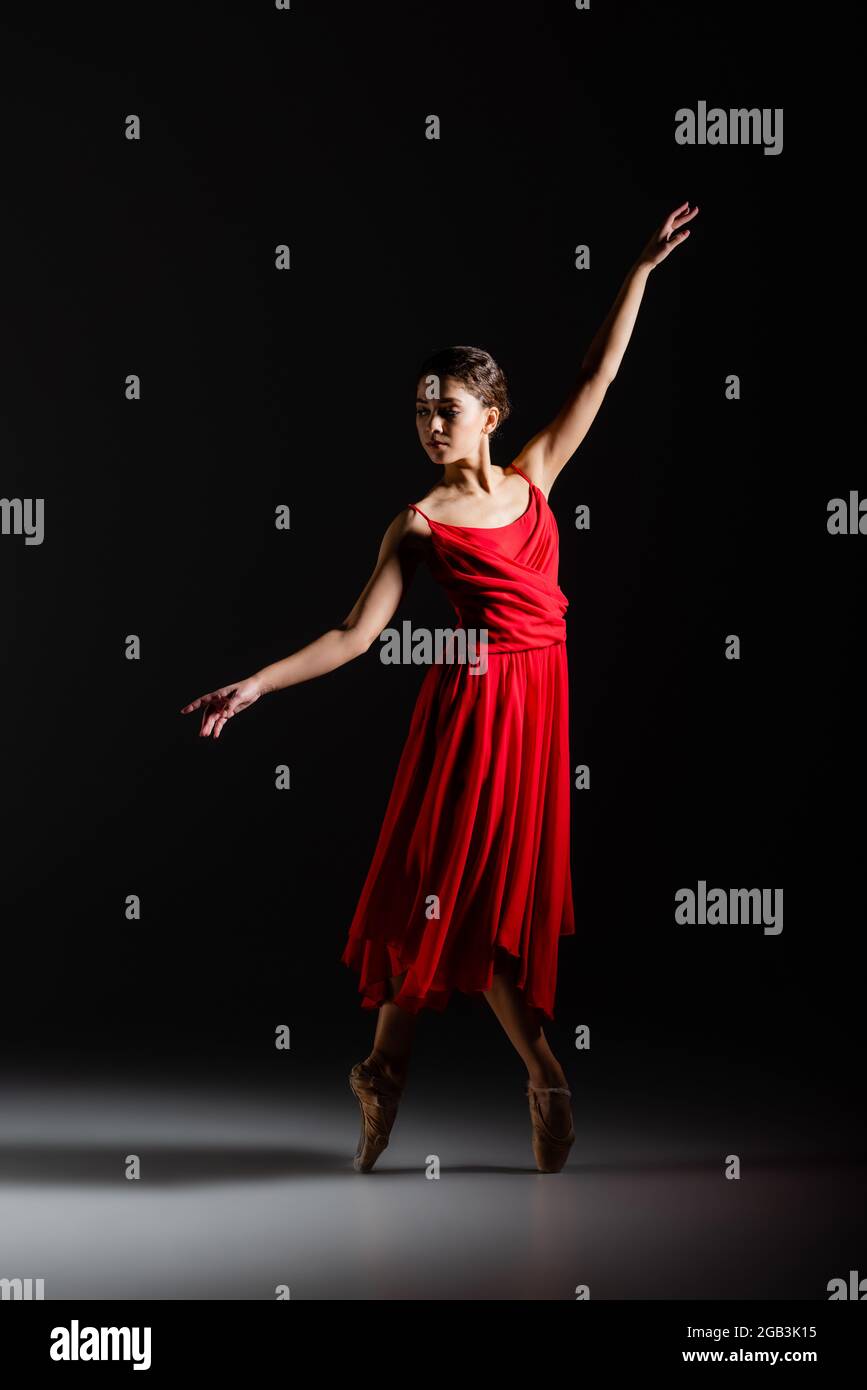 Ballerina in red dress hi-res stock photography and images - Alamy