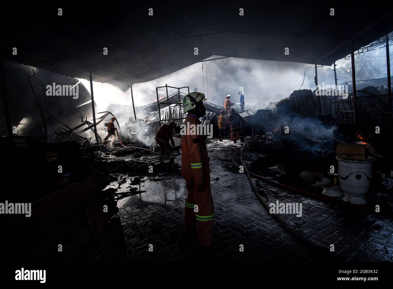 West Java, Indonesia. 2nd Aug, 2021. Firefighters try to extinguish the ...