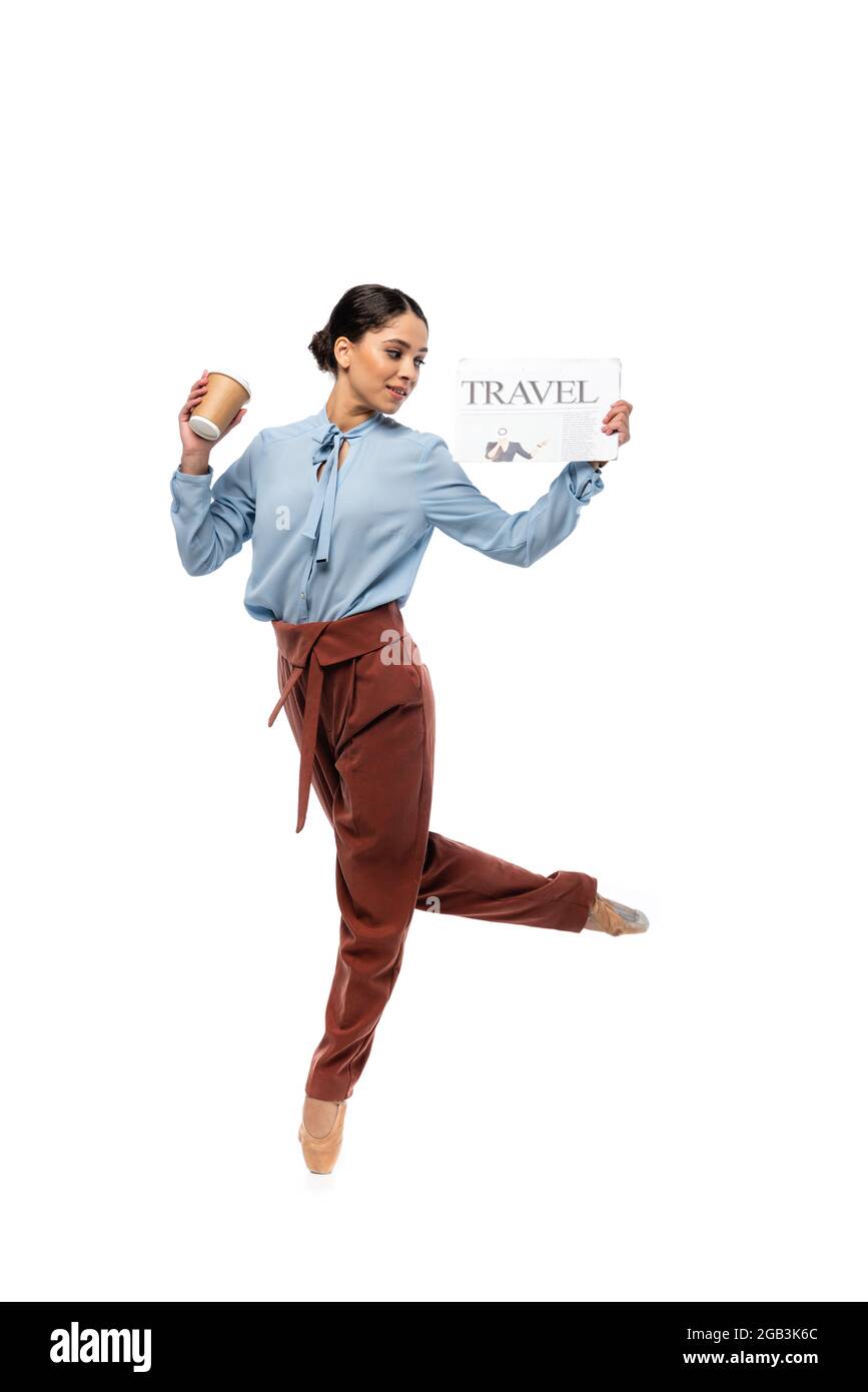 Ballerina reading news and holding coffee to go isolated on white Stock ...
