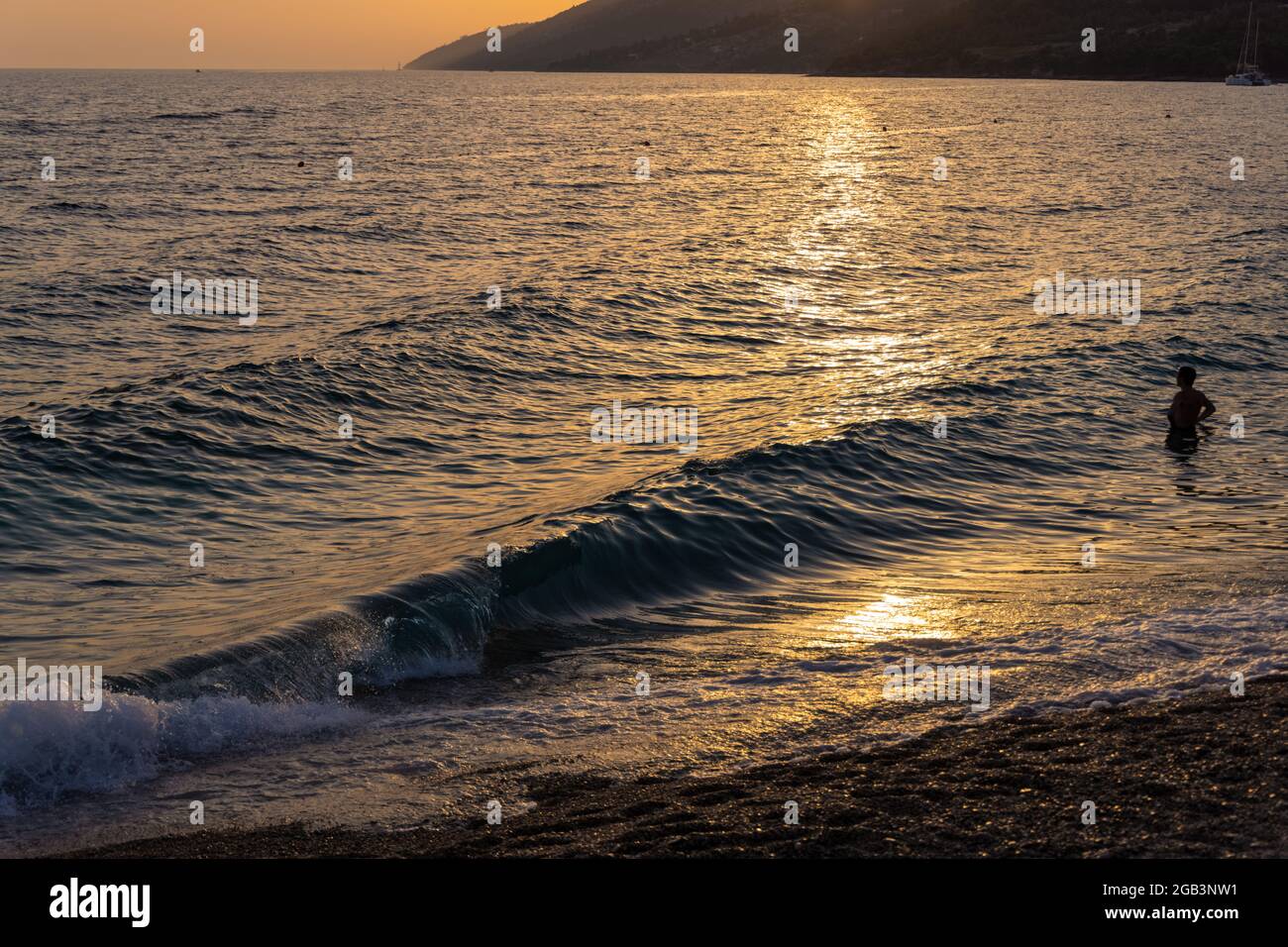 Sunset on the Zlatni Rat beach near Bol town, Brač Island, the Adriatic ...