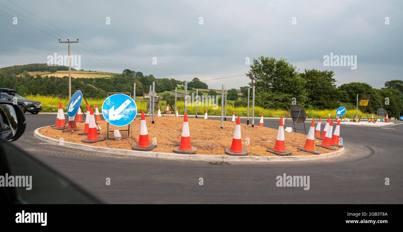 Modbury, South Devon, England, UK. 2021. Red and white traffic cones ...