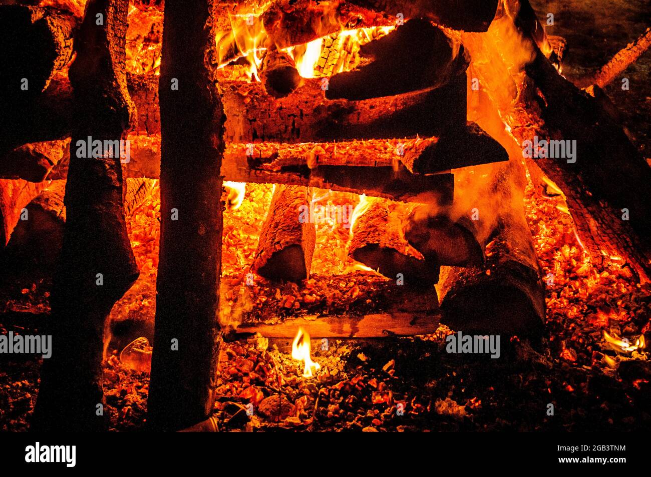 Burning firewood, fire close-up. burning bonfire outdoors. fire with ...