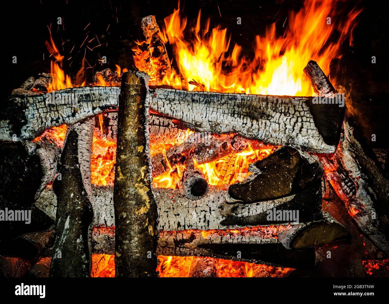 Burning firewood, fire close-up. burning bonfire outdoors. fire with ...