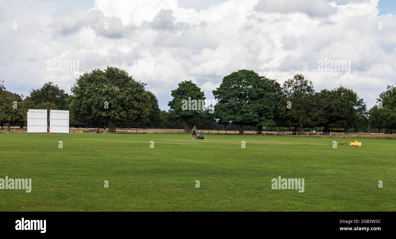 Rolling the cricket pitch hi-res stock photography and images - Alamy