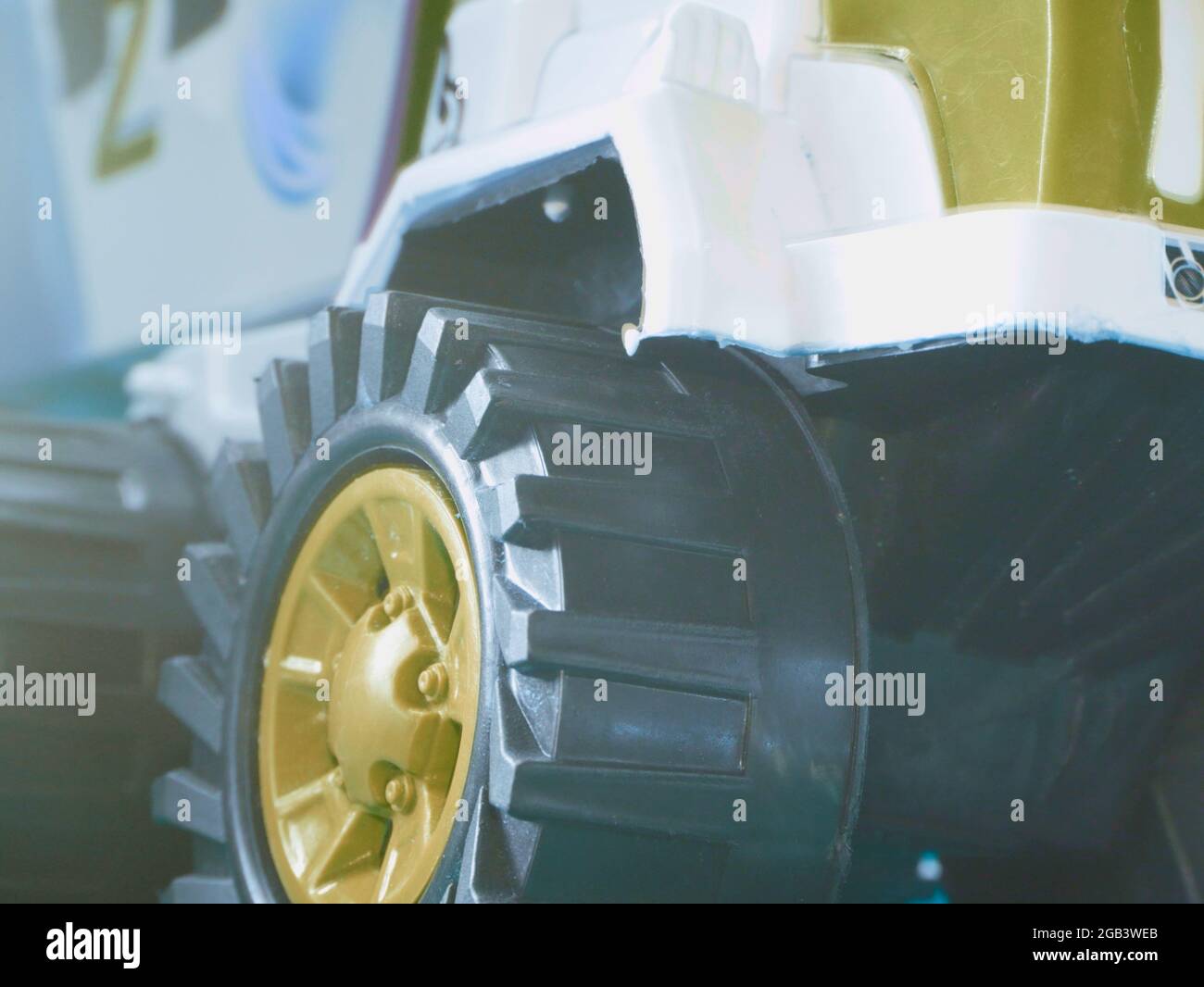 Toy truck wheel closeup commercial background for kids Stock Photo - Alamy