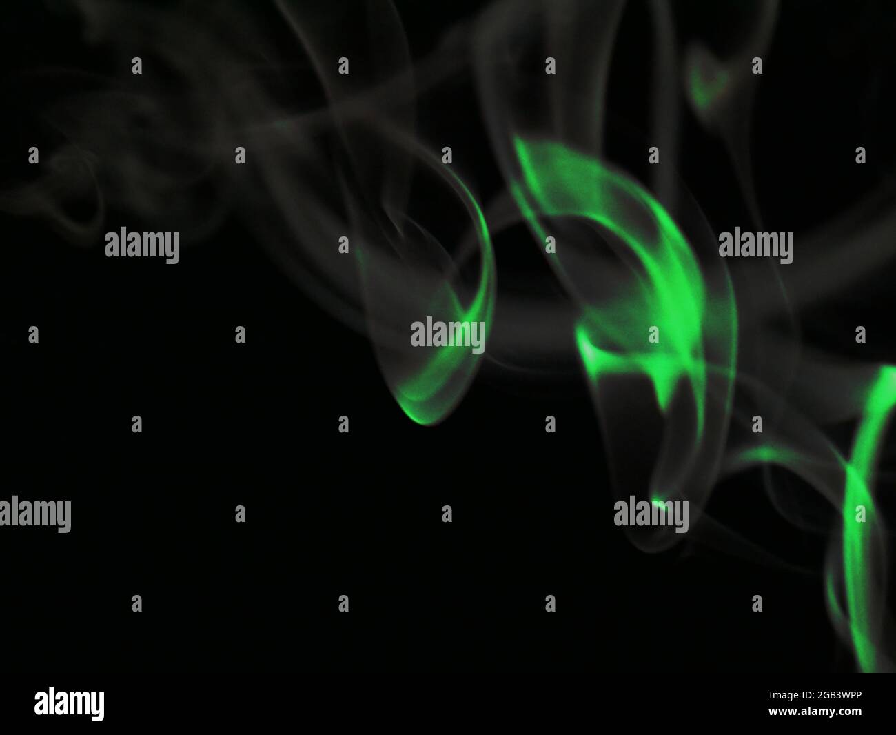 Green Smoke monster face side view created on black background for ...