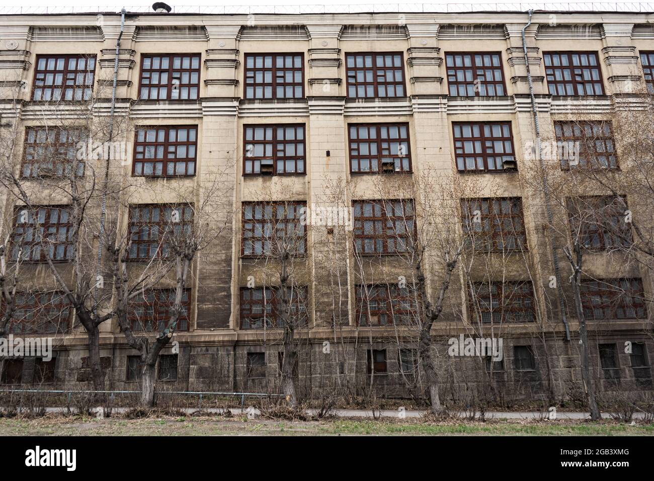 Vintage architecture classical facade old gray building front view. A ...