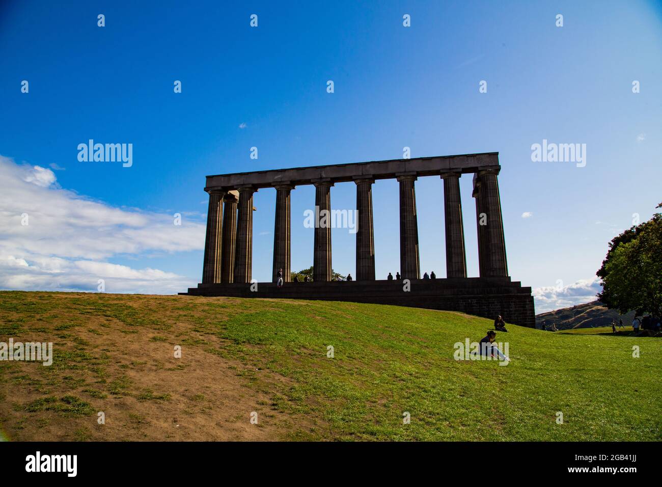 Unfinished classic-style column monument on top of a hill Stock Photo ...