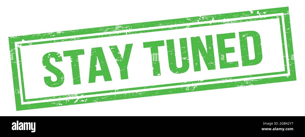 STAY TUNED text on green grungy vintage rectangle stamp Stock Photo - Alamy
