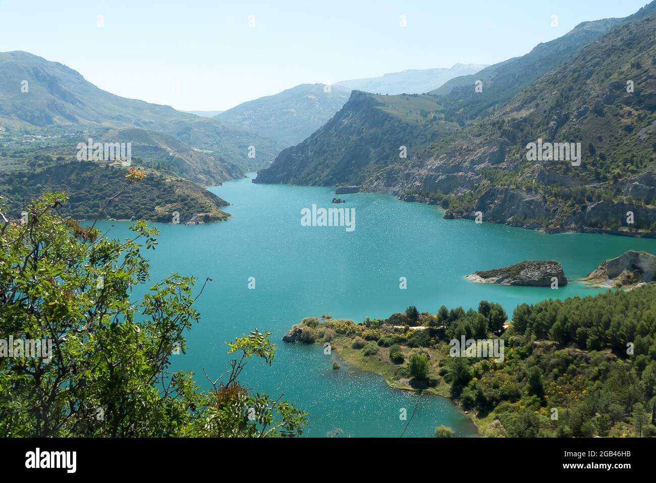 Granada in Spain: the turquoise waters of the Embalse de Canales Stock ...