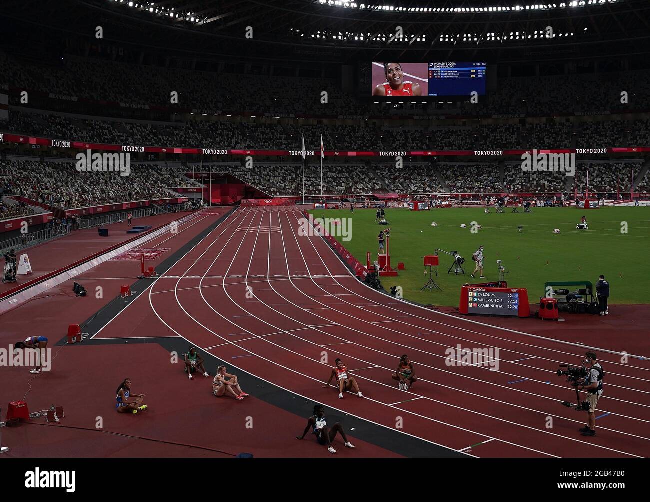 Tokyo, Japan. 2nd Aug, 2021. Athletes rest after the Women's 200m Semi ...