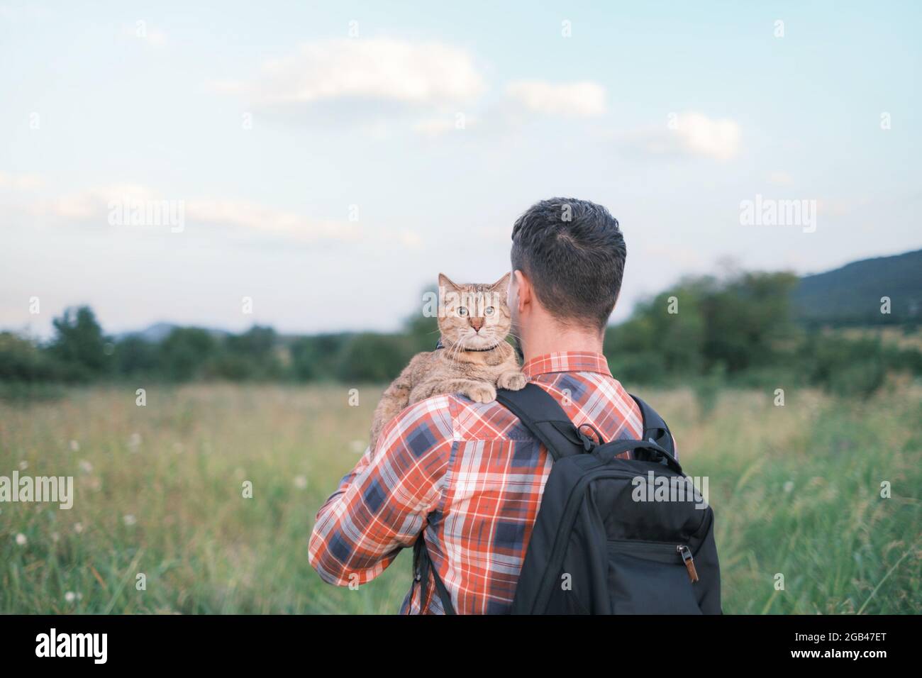 Man walking cat hi-res stock photography and images - Alamy