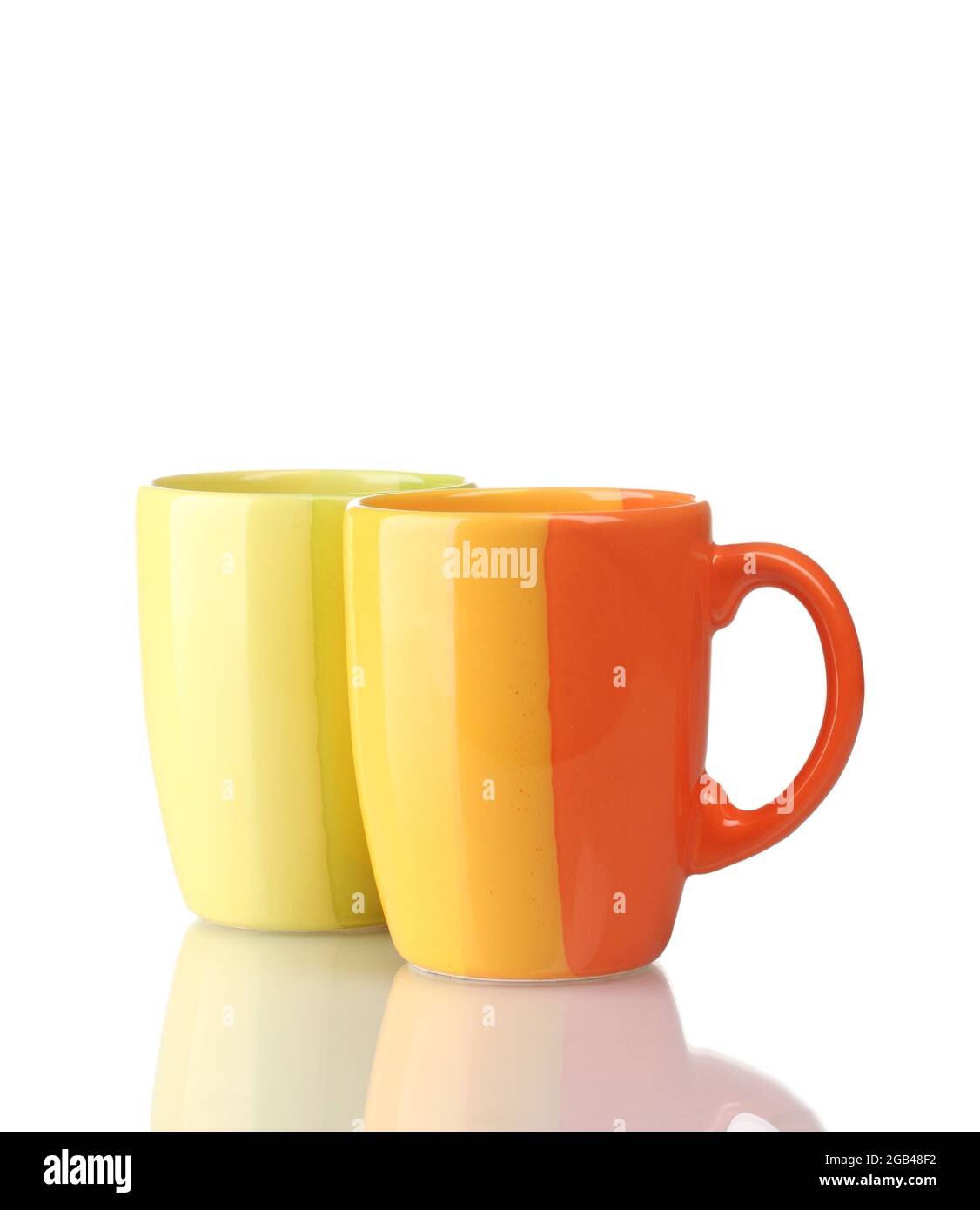Two color cups isolated on white Stock Photo - Alamy