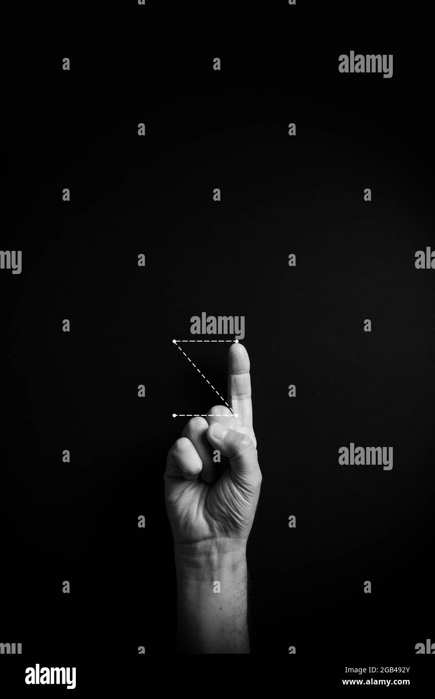 Dramatic B&W image of male hand demonstrating ASL American sign ...