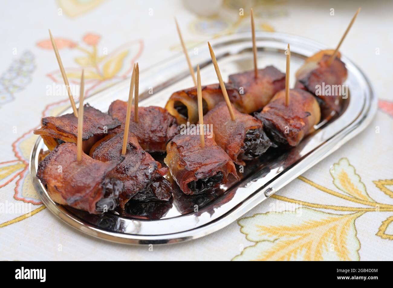 Pruneaux au lard - French appetizers in Burgundy, Pommard FR Stock ...