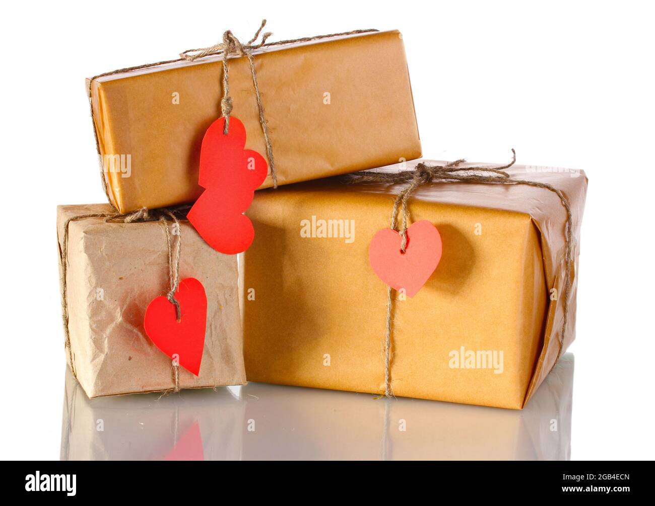 Three parcels with blank heart-shaped labels isolated on white Stock ...