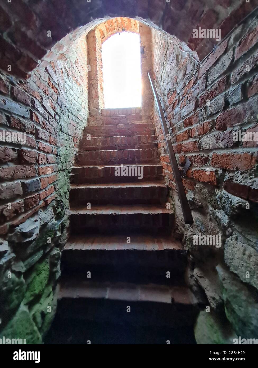 brick steps lead to an old medieval cellar Stock Photo - Alamy