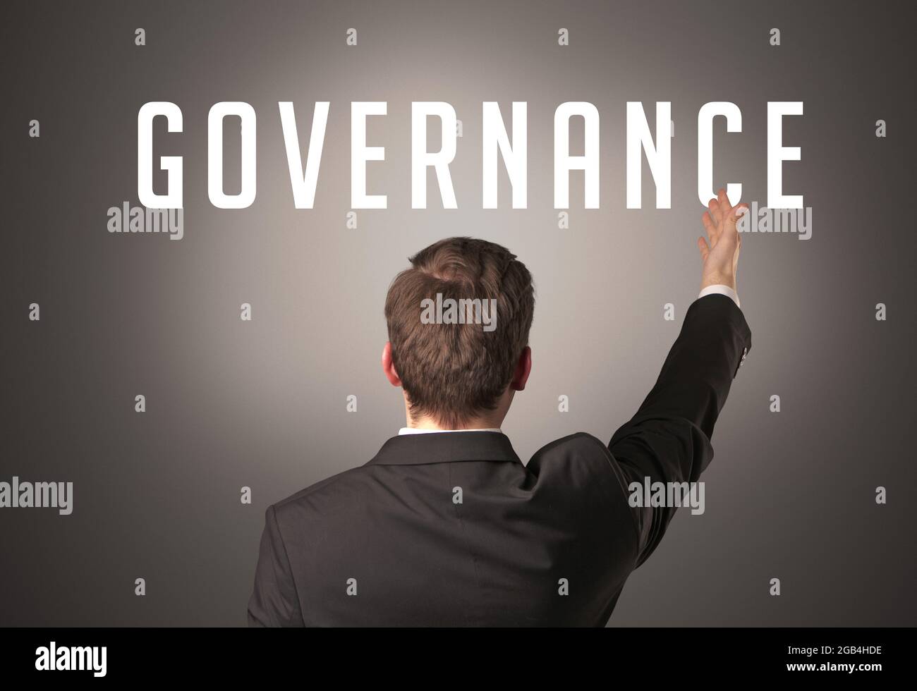 Rear view of a businessman, powerfull business concept Stock Photo - Alamy