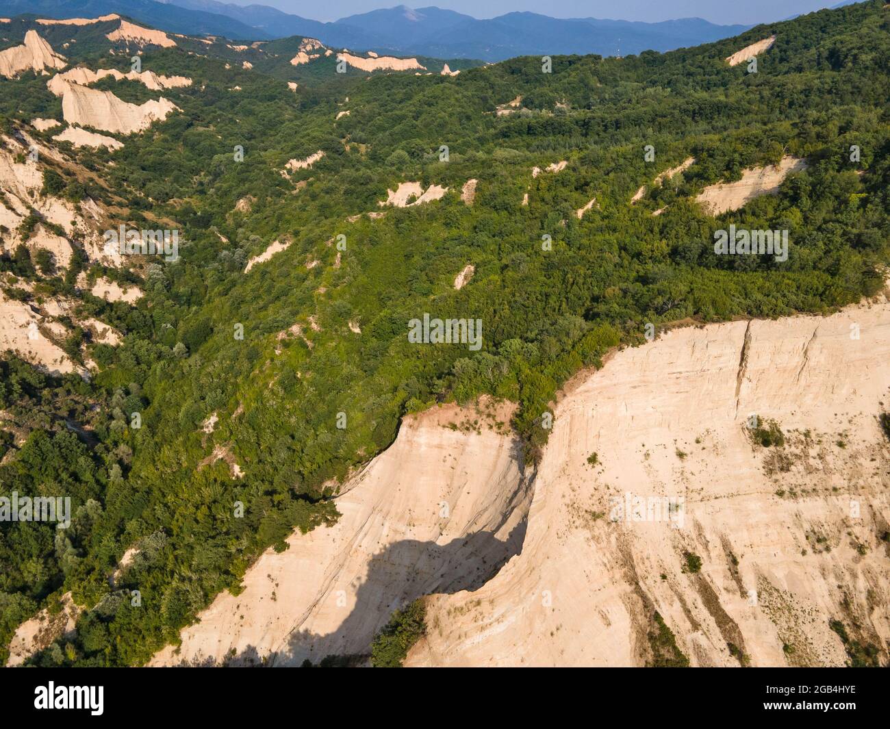 Aerial sunset view of Rozhen sand pyramids, Blagoevgrad region ...