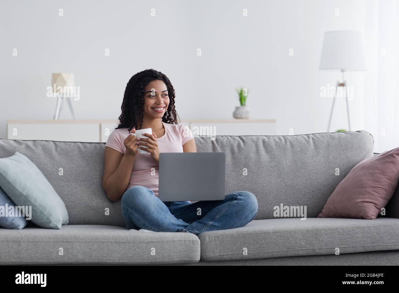 Rest and relax at home with modern device, work at home and coffee ...