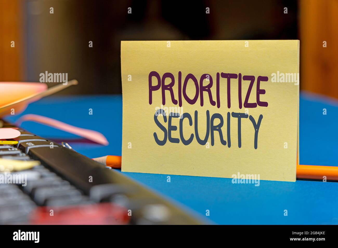 Text showing inspiration Prioritize Security. Business overview ...