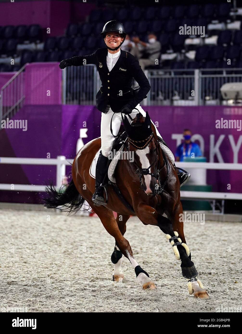 Julia Krajewski of Germany riding Amande De B'neville celebrates ...
