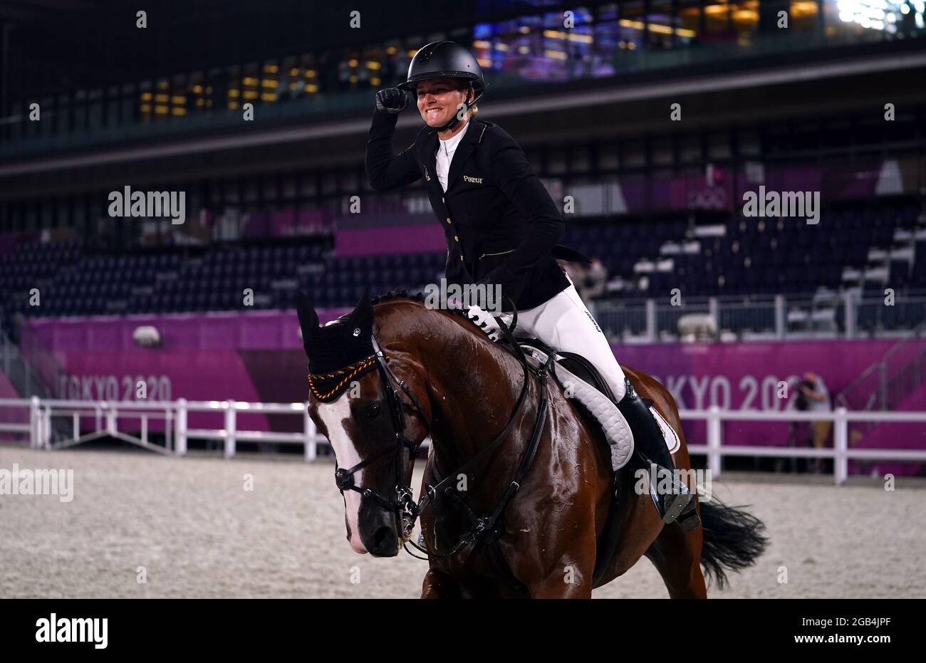 Julia Krajewski of Germany riding Amande De B'neville celebrates ...