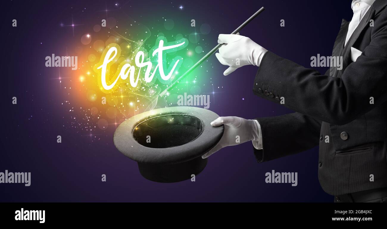 Young magician is showing magic trick Stock Photo - Alamy