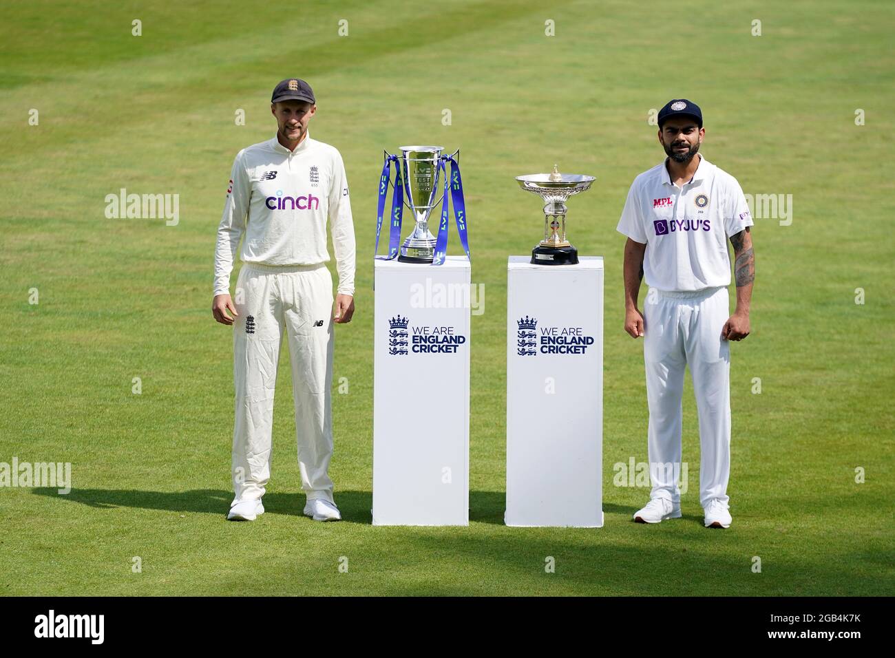 England's Joe Root (left) and India's Virat Kohli pose with the series ...