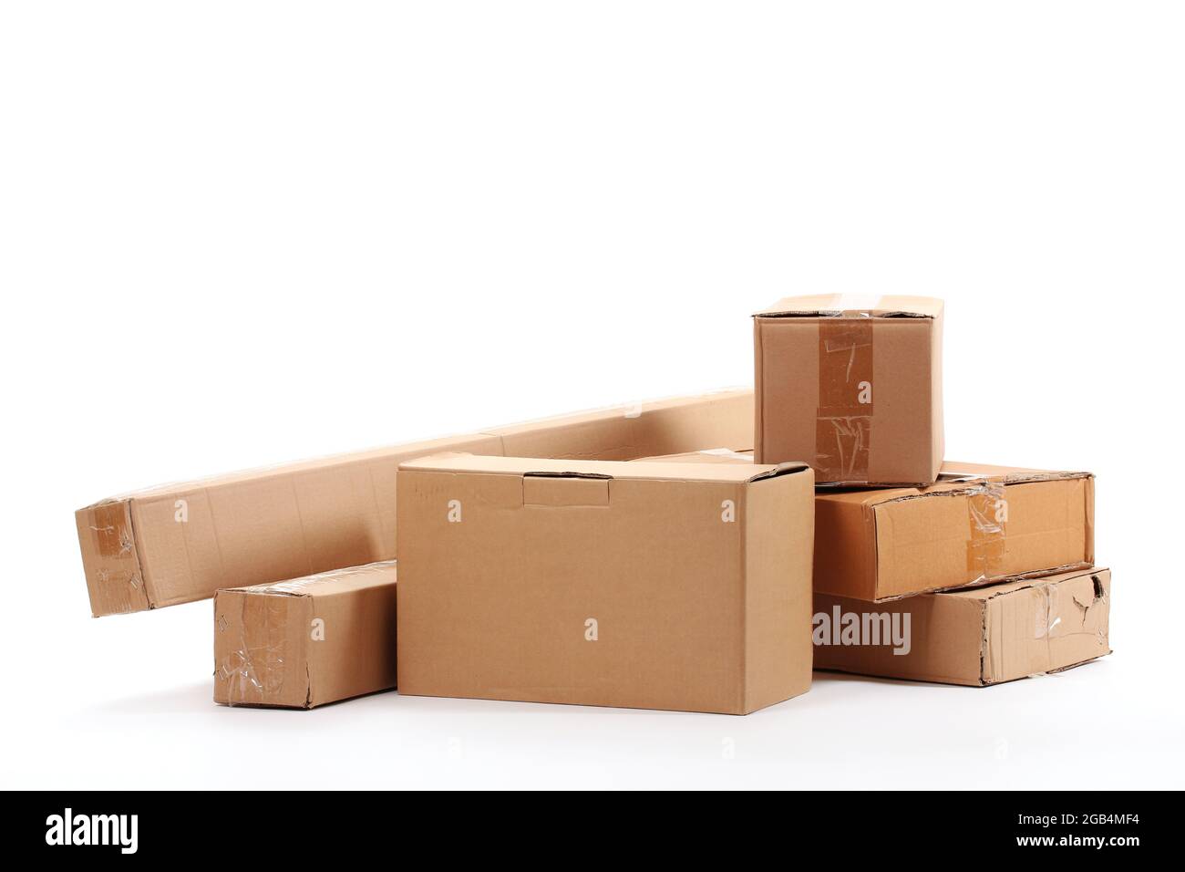 Brown cardboard boxes isolated on white Stock Photo - Alamy