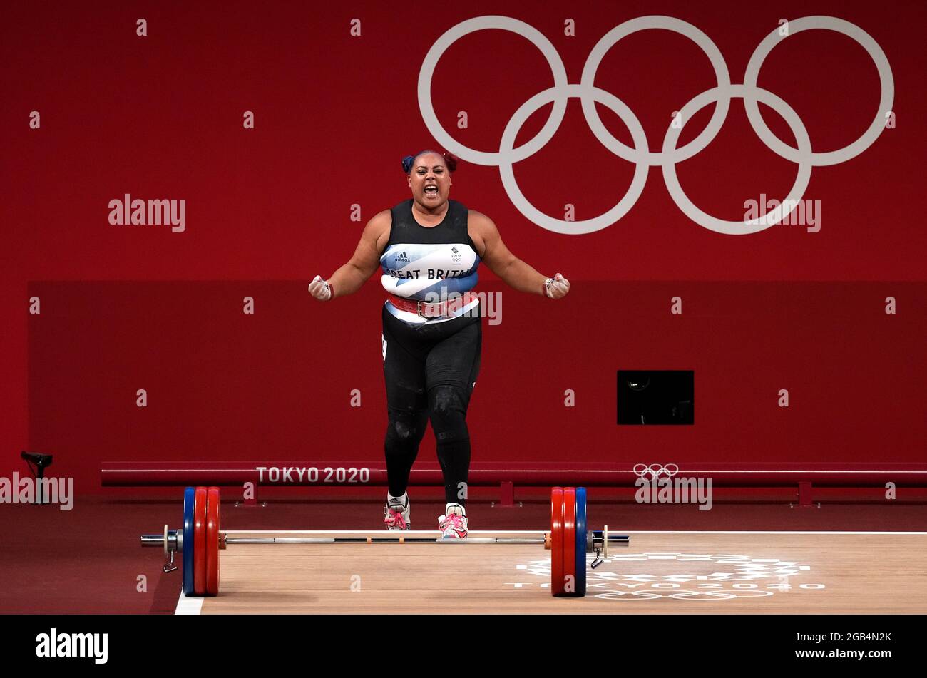Great Britain's Emily Campbell celebrates taking silver during the +87 ...