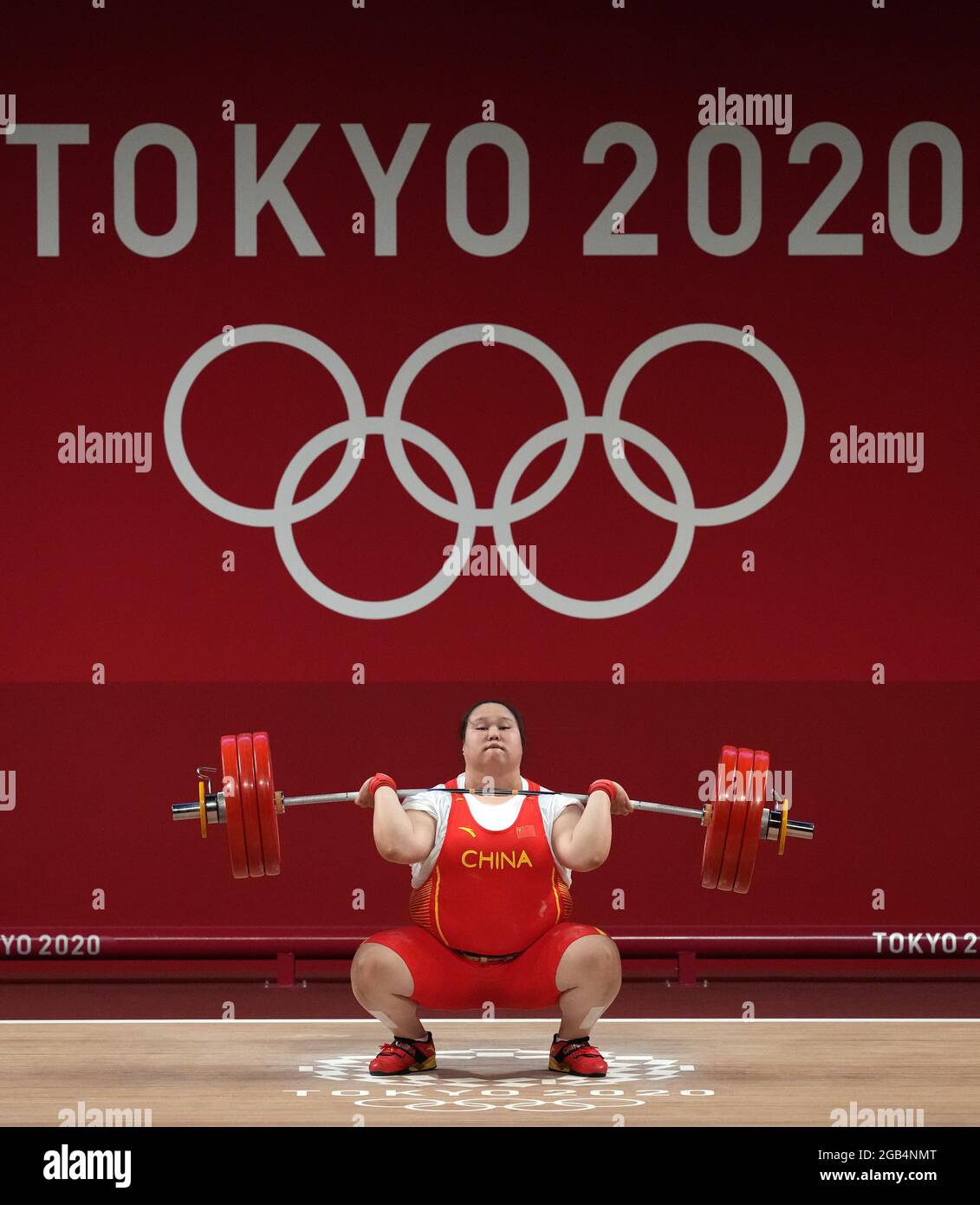China's Wenwen Li in the Women's +87kg Group A Weightlifting at Tokyo ...