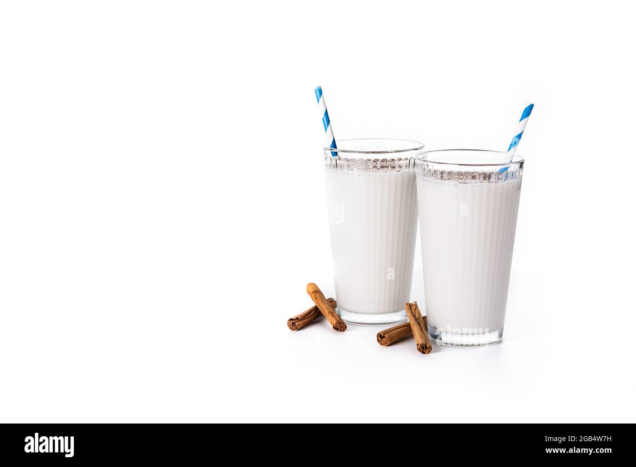 Fresh horchata with cinnamon in glass isolated on white background ...