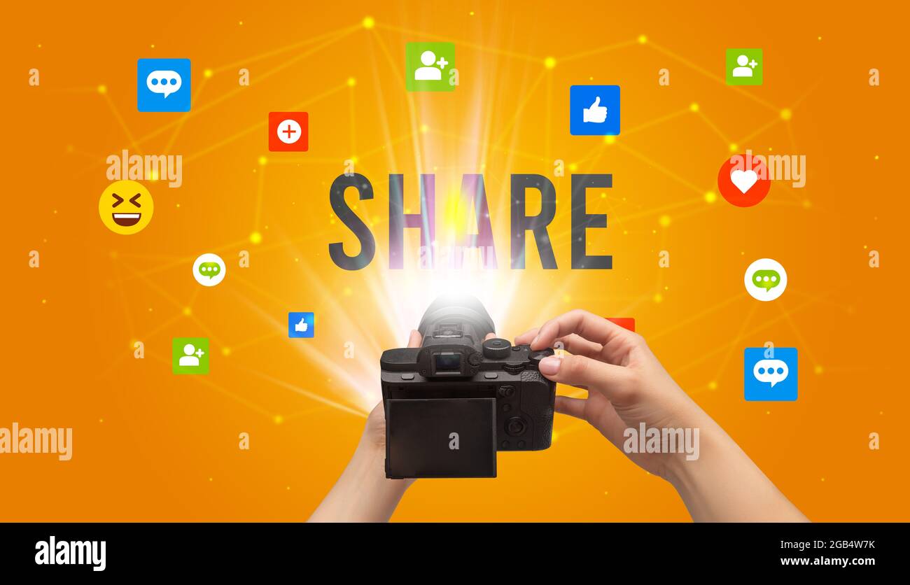 Using camera to capture social media content Stock Photo - Alamy