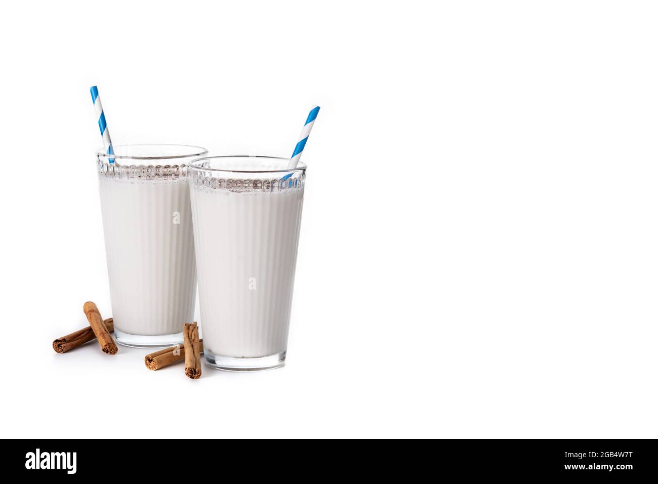Fresh horchata with cinnamon in glass isolated on white background ...
