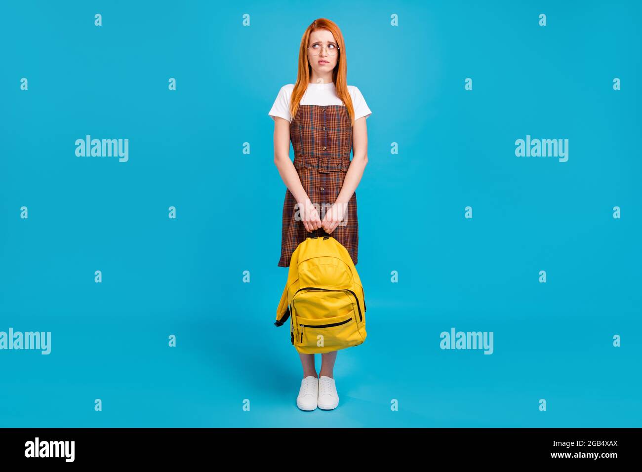 Full length body size view of attractive frustrated nerd girl going ...