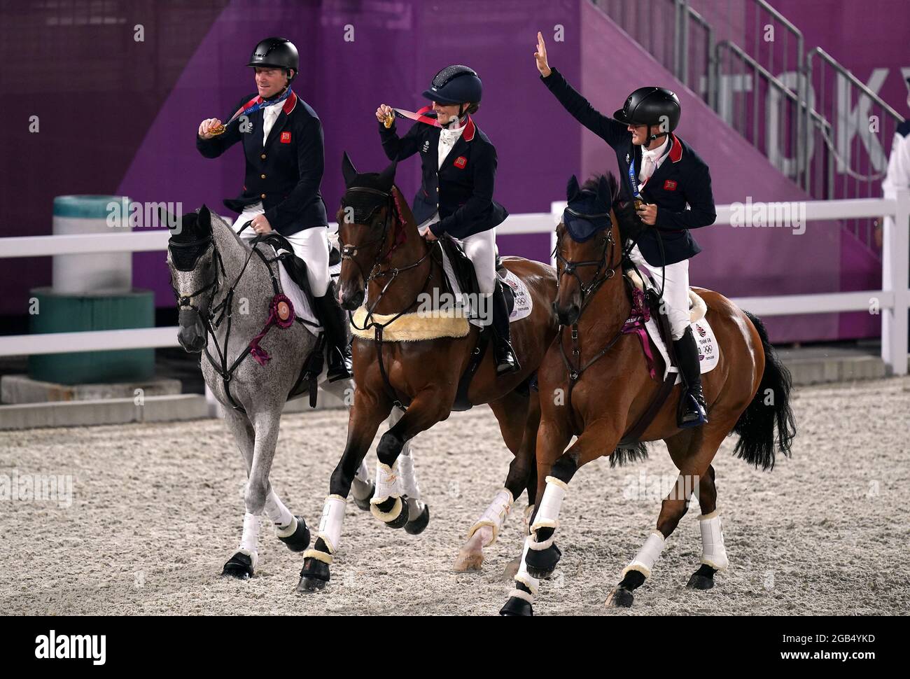 Great Britain's Laura Collett, Tom McEwen and Oliver Townend with their ...