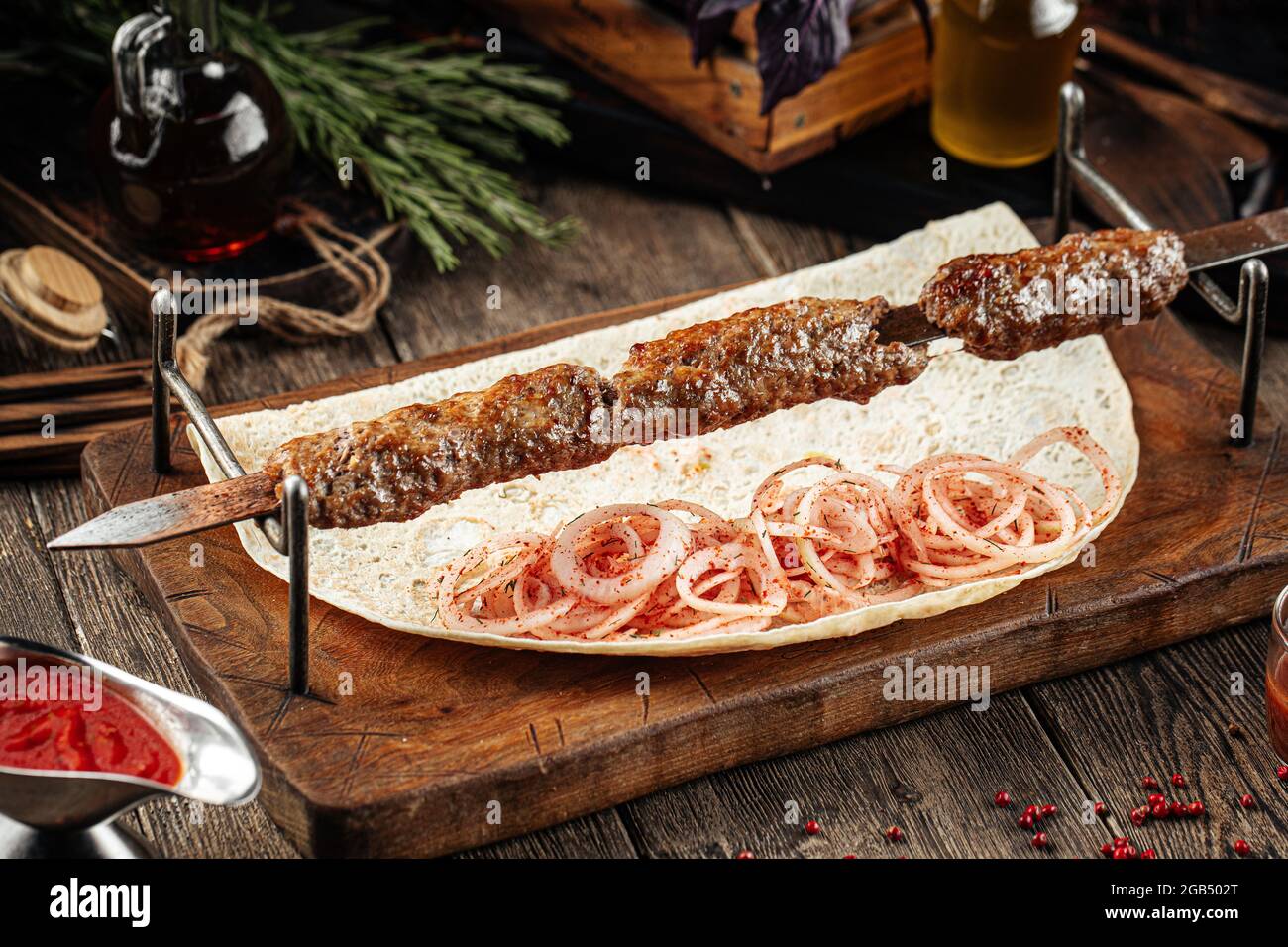 Caucasian beef lyulya kebab with marinated onion Stock Photo - Alamy