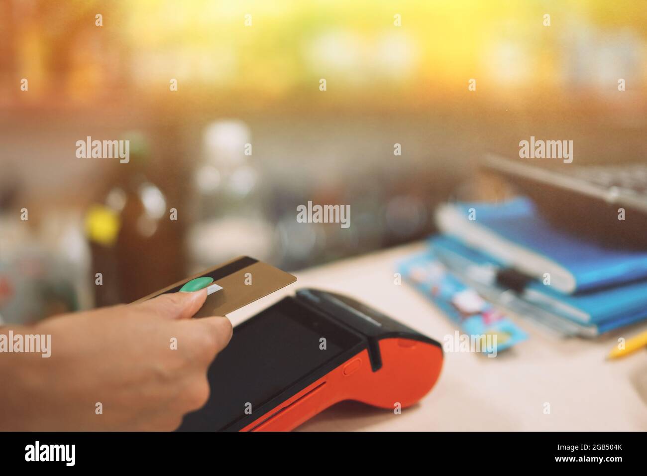 Contactless payment from card via pos terminal Stock Photo - Alamy