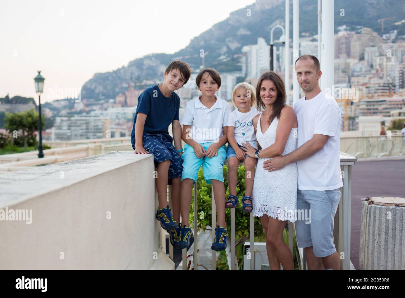 Family portrait in Monaco Ville summertime, view from above to Monaco ...