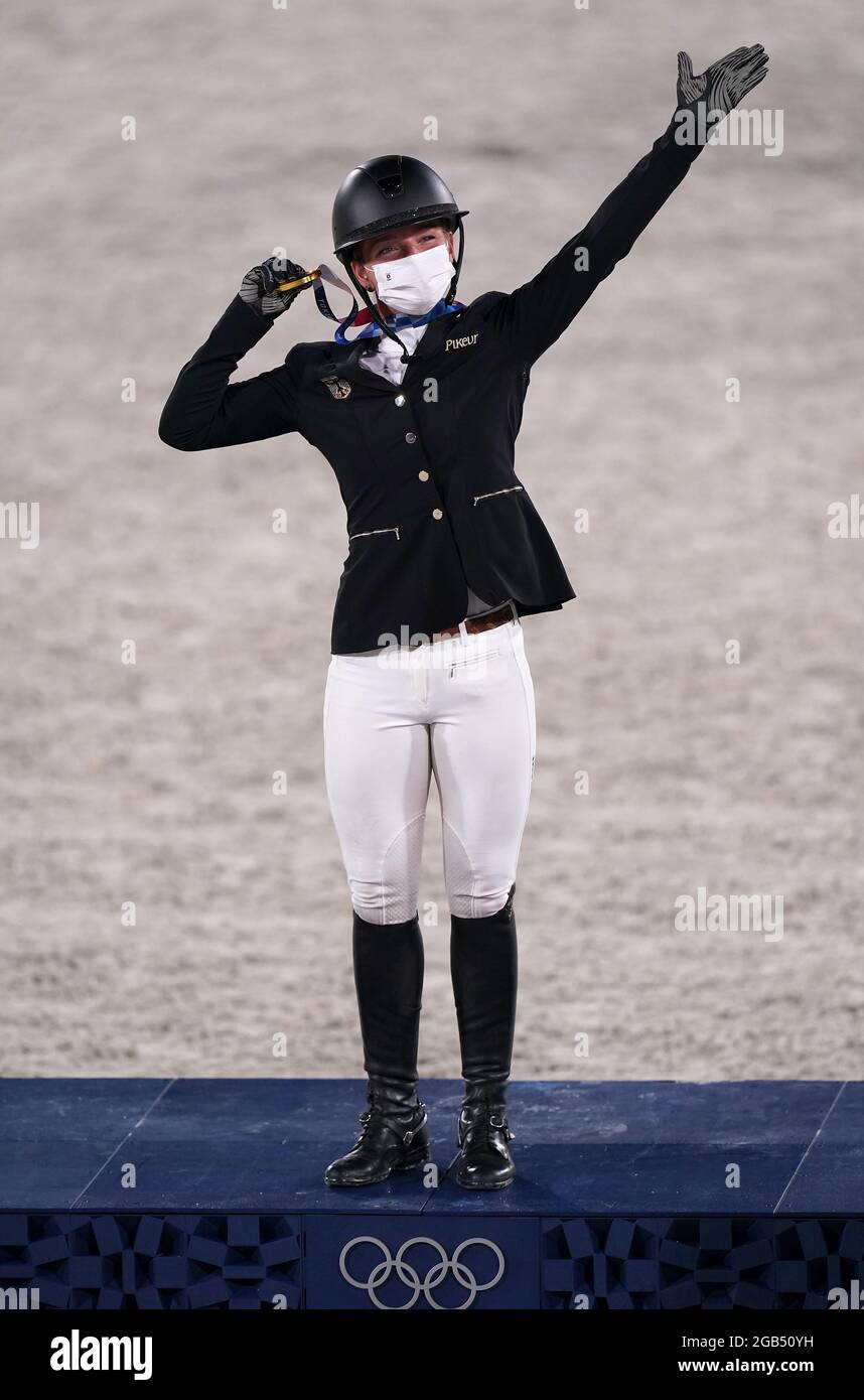 Julia Krajewski of Germany with her Gold medal after riding Amande De B ...