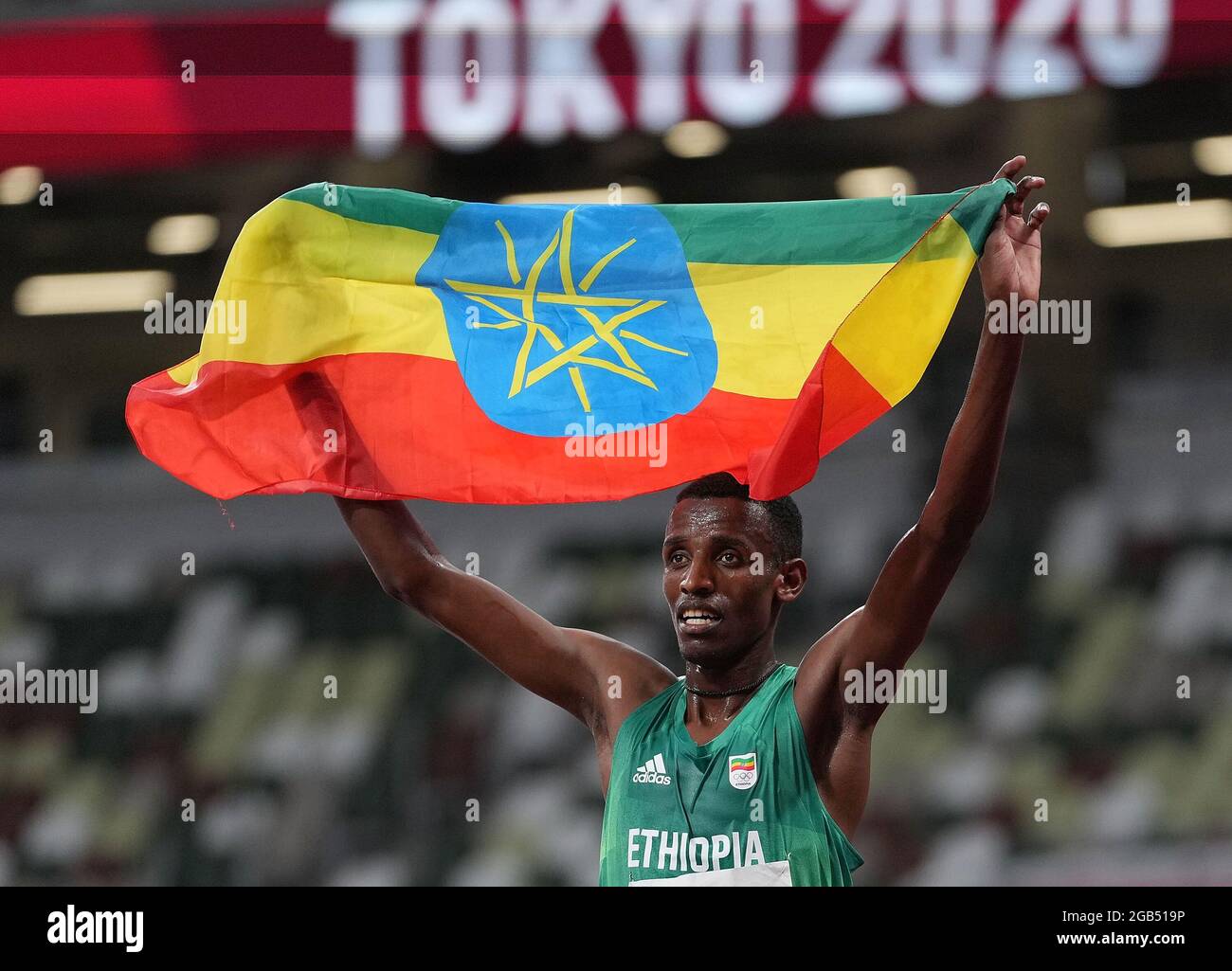 Tokyo, Japan. 2nd Aug, 2021. Lamecha Girma of Ethiopia celebrates after ...