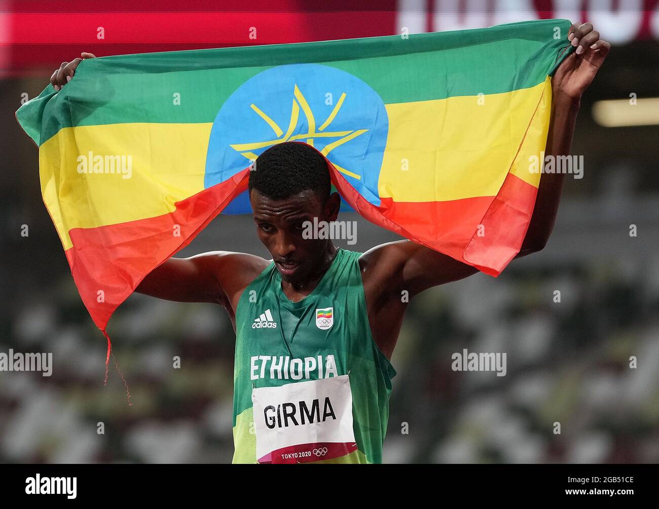Tokyo, Japan. 2nd Aug, 2021. Lamecha Girma of Ethiopia celebrates after ...