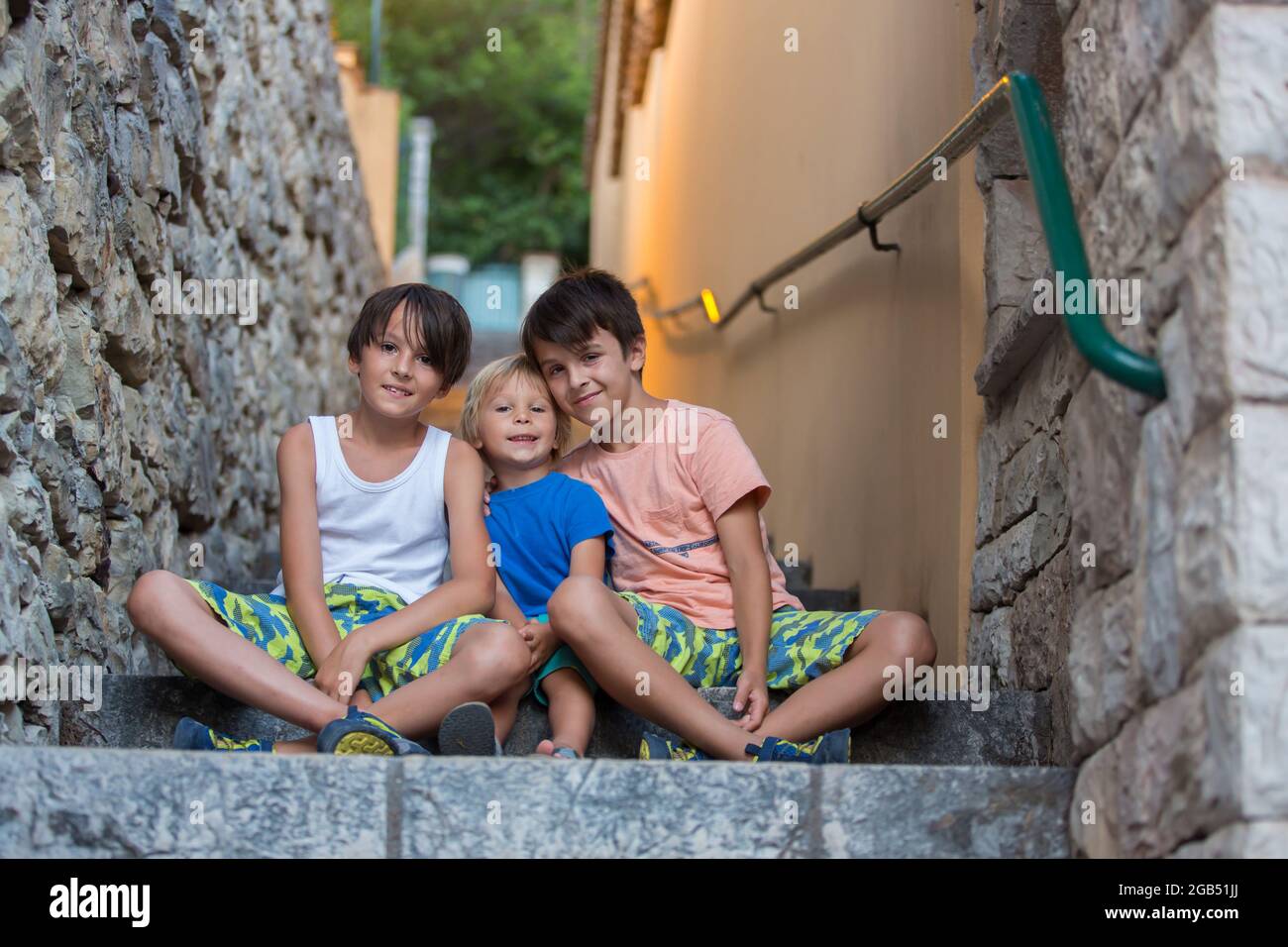 Children playing on staircase hi-res stock photography and images - Alamy