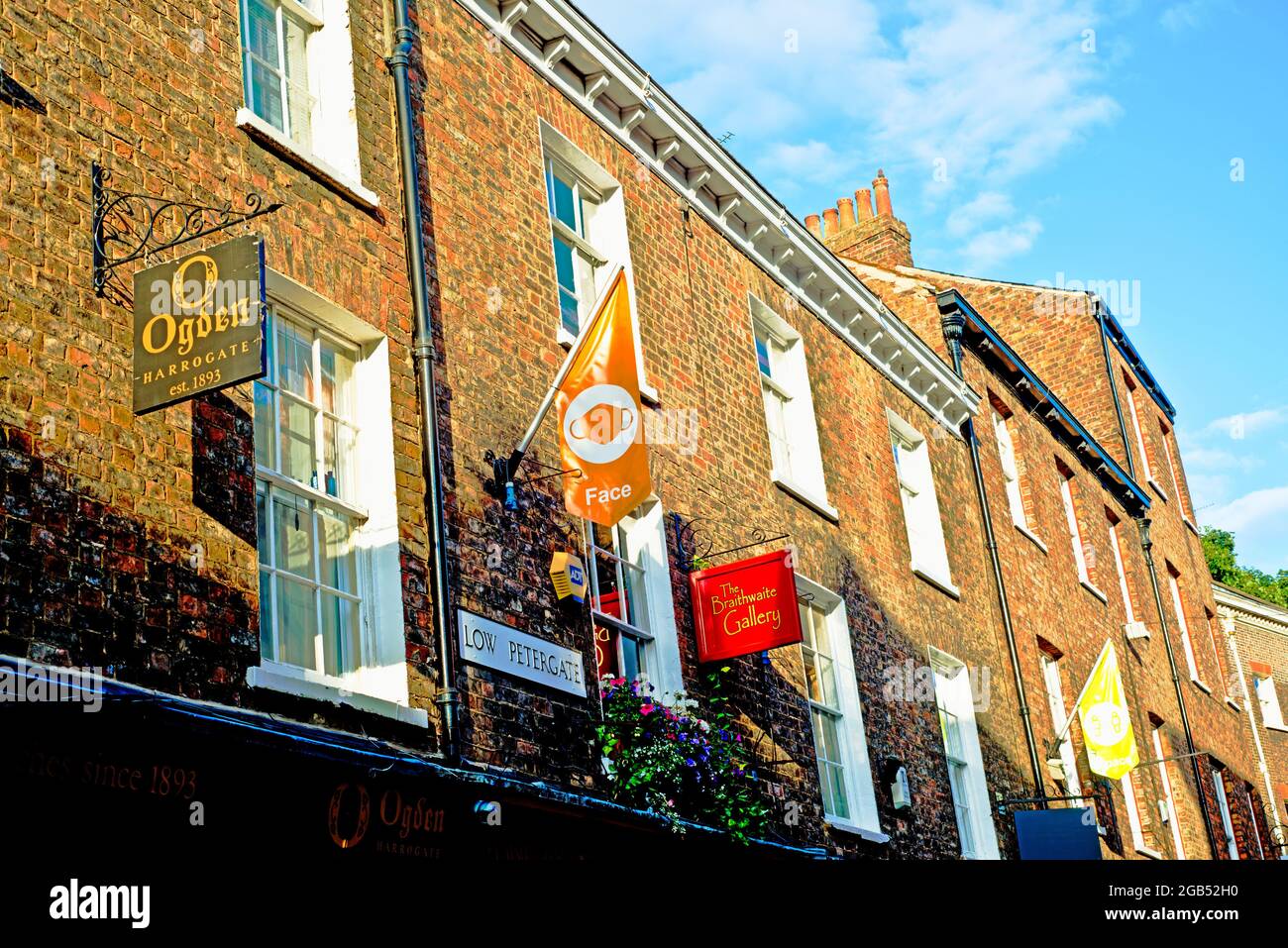 Low Petergate, Shop Signs, York, England Stock Photo - Alamy