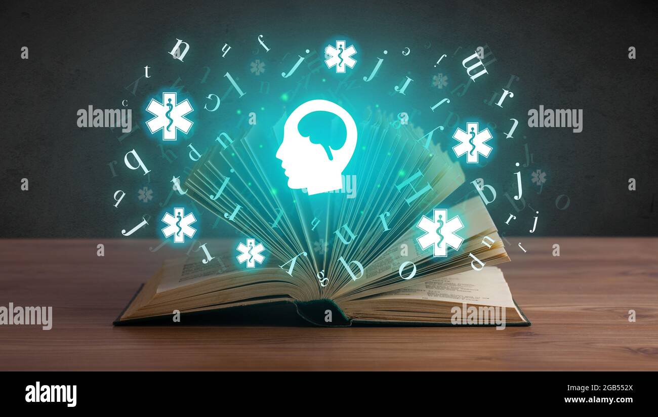 Open medical book with health icons above Stock Photo - Alamy